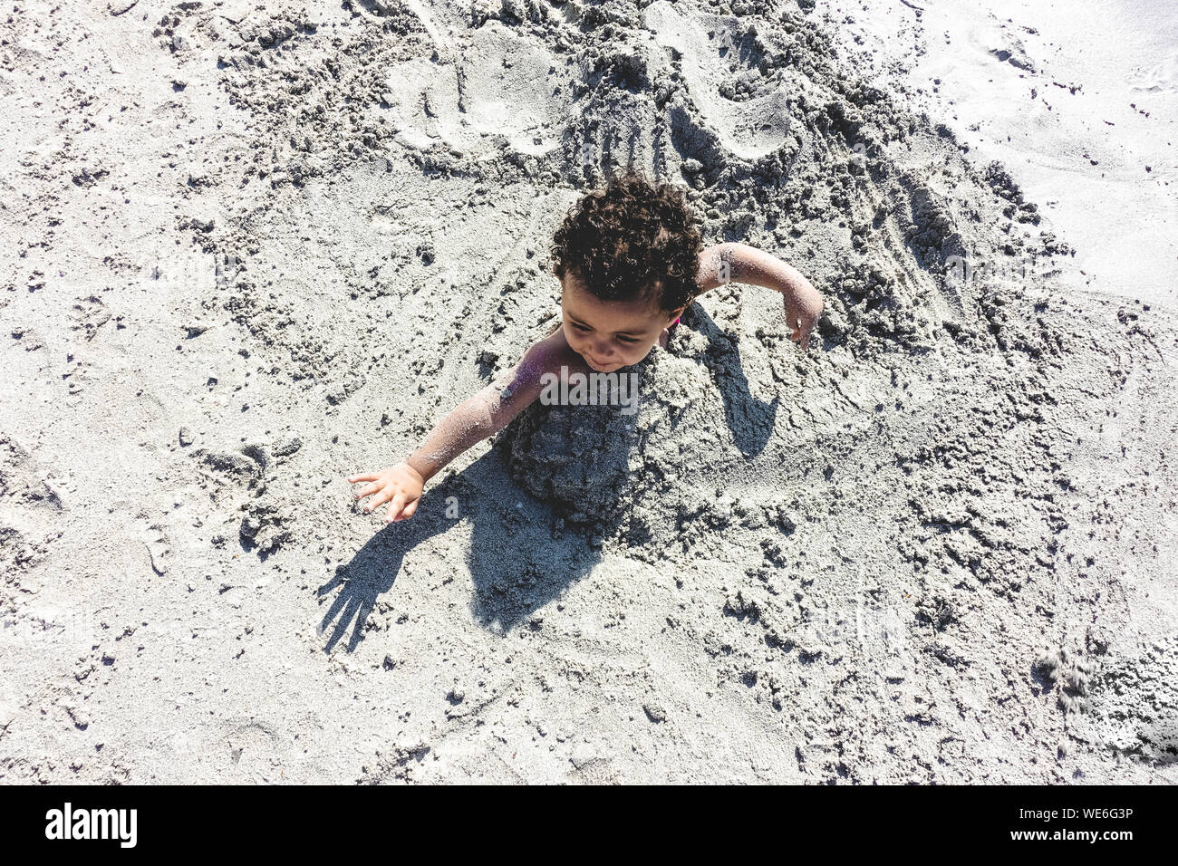 Boy in sand hi-res stock photography and images - Alamy