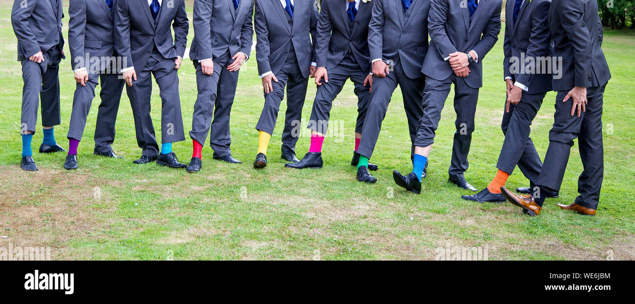 Row of men hi-res stock photography and images - Alamy