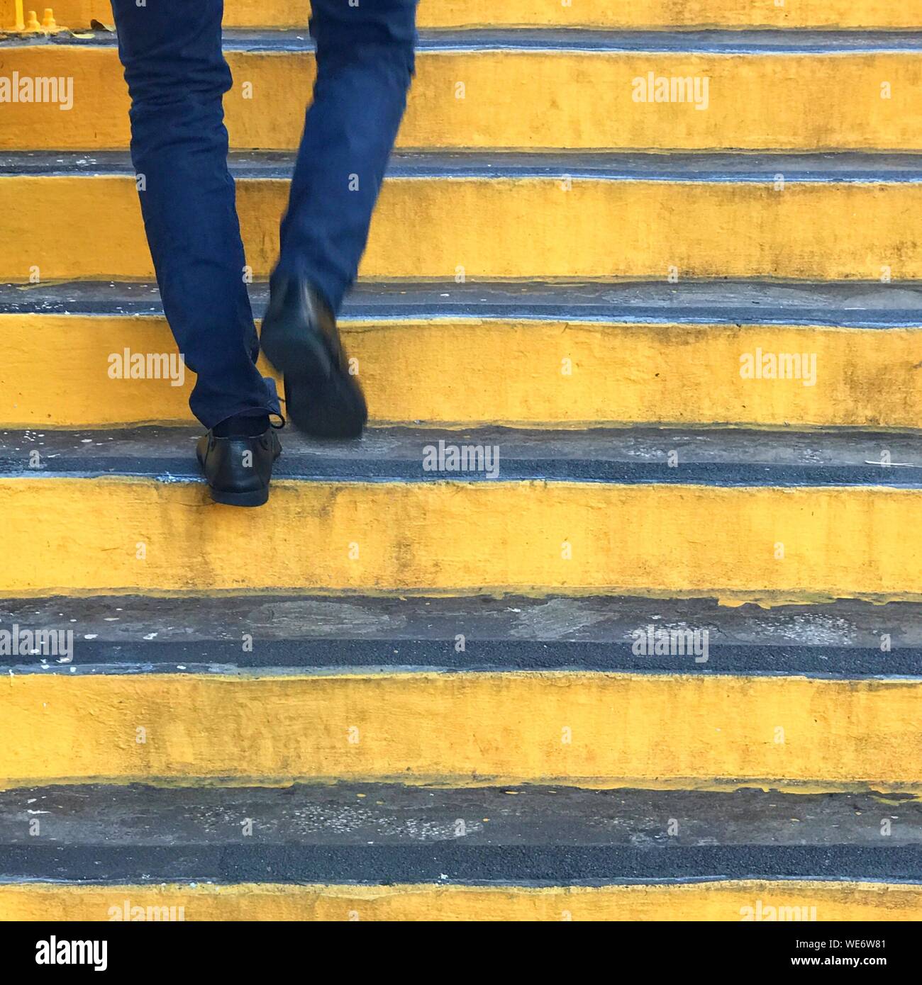 Man walking steps hi-res stock photography and images - Alamy