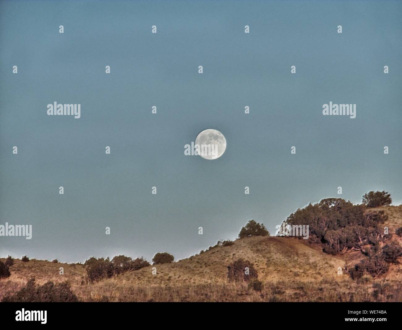 Moon over landscape hi-res stock photography and images - Alamy