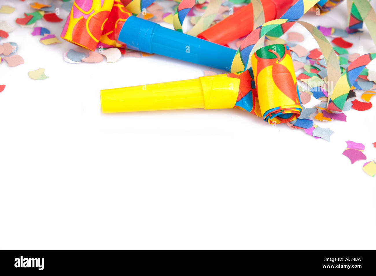 Multi Colored Confetti Over White Background Stock Photo - Alamy