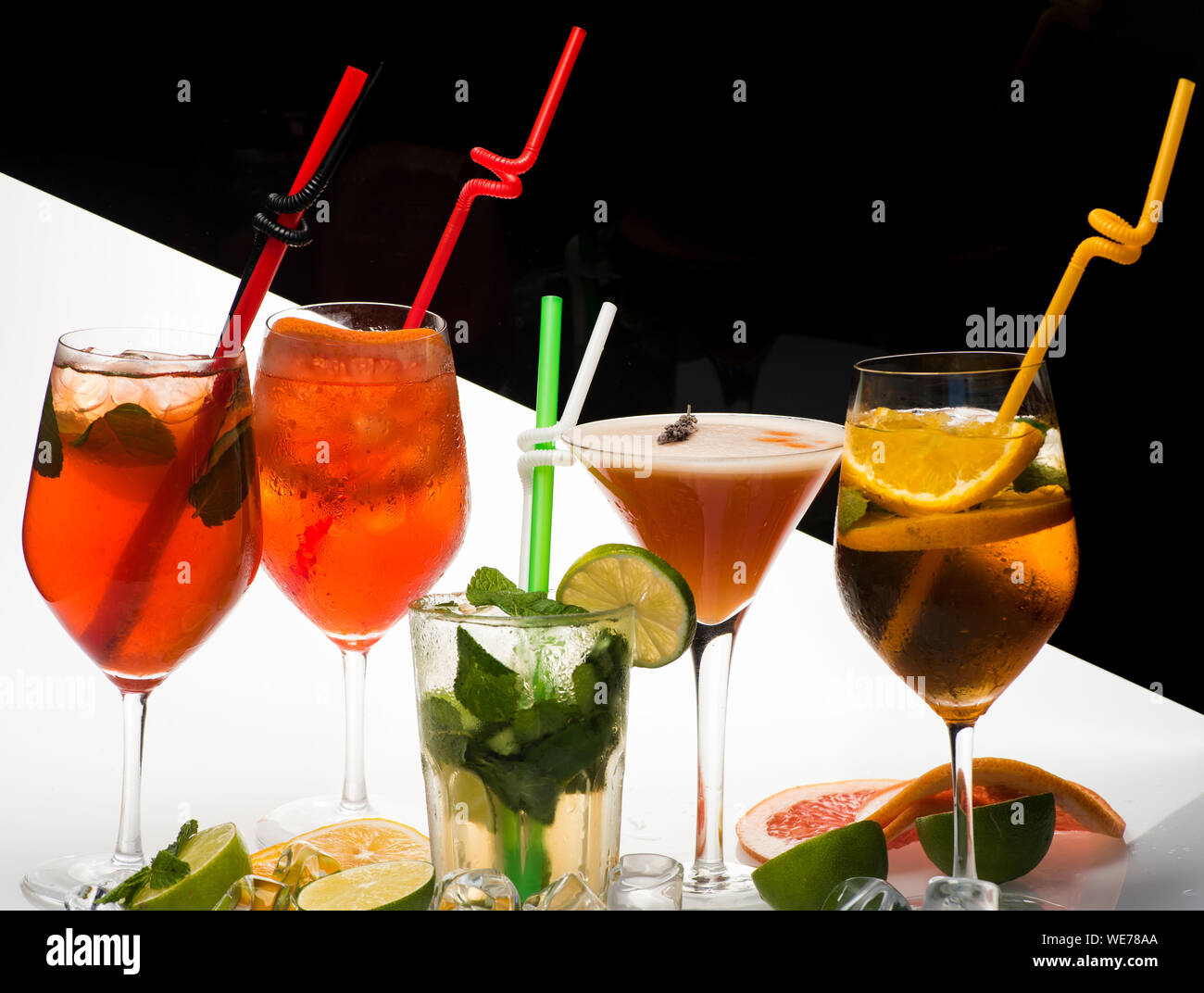 Party and summer vacation. Fruit slice and cocktail glass at bar ...