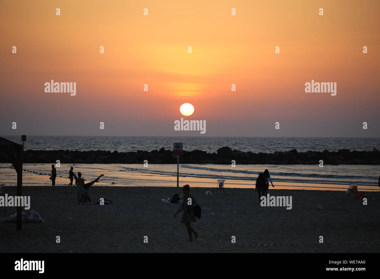 Sunset Israeli Beaches People Having Fun In Summer, Sun And Sea Stock ...