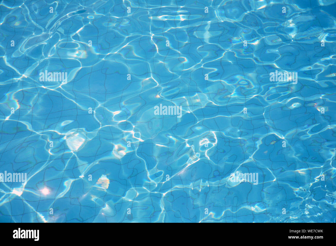Swimming pool bottom caustics ripple and flow with waves background ...