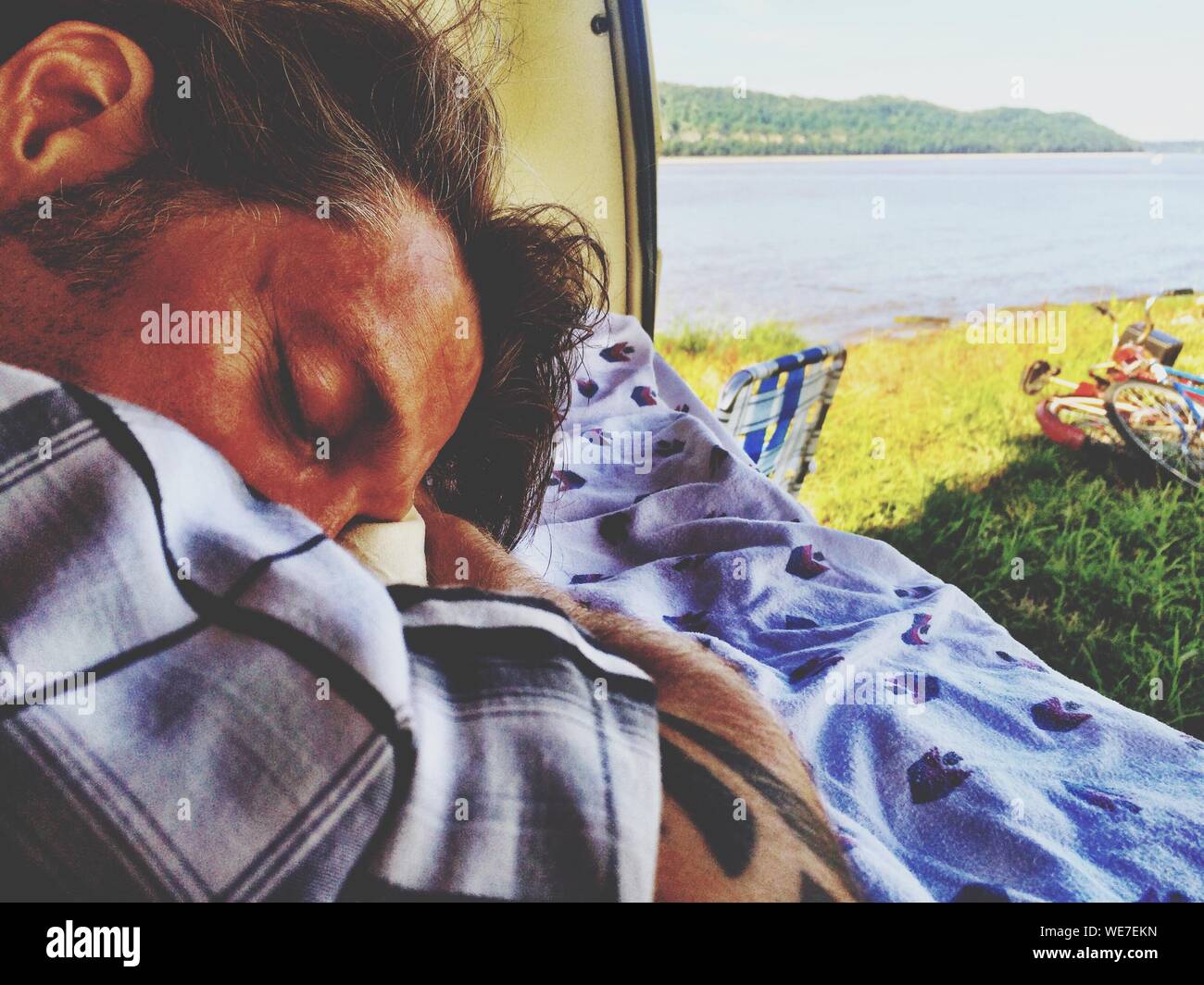 Man sleeping in vehicle hi-res stock photography and images - Alamy