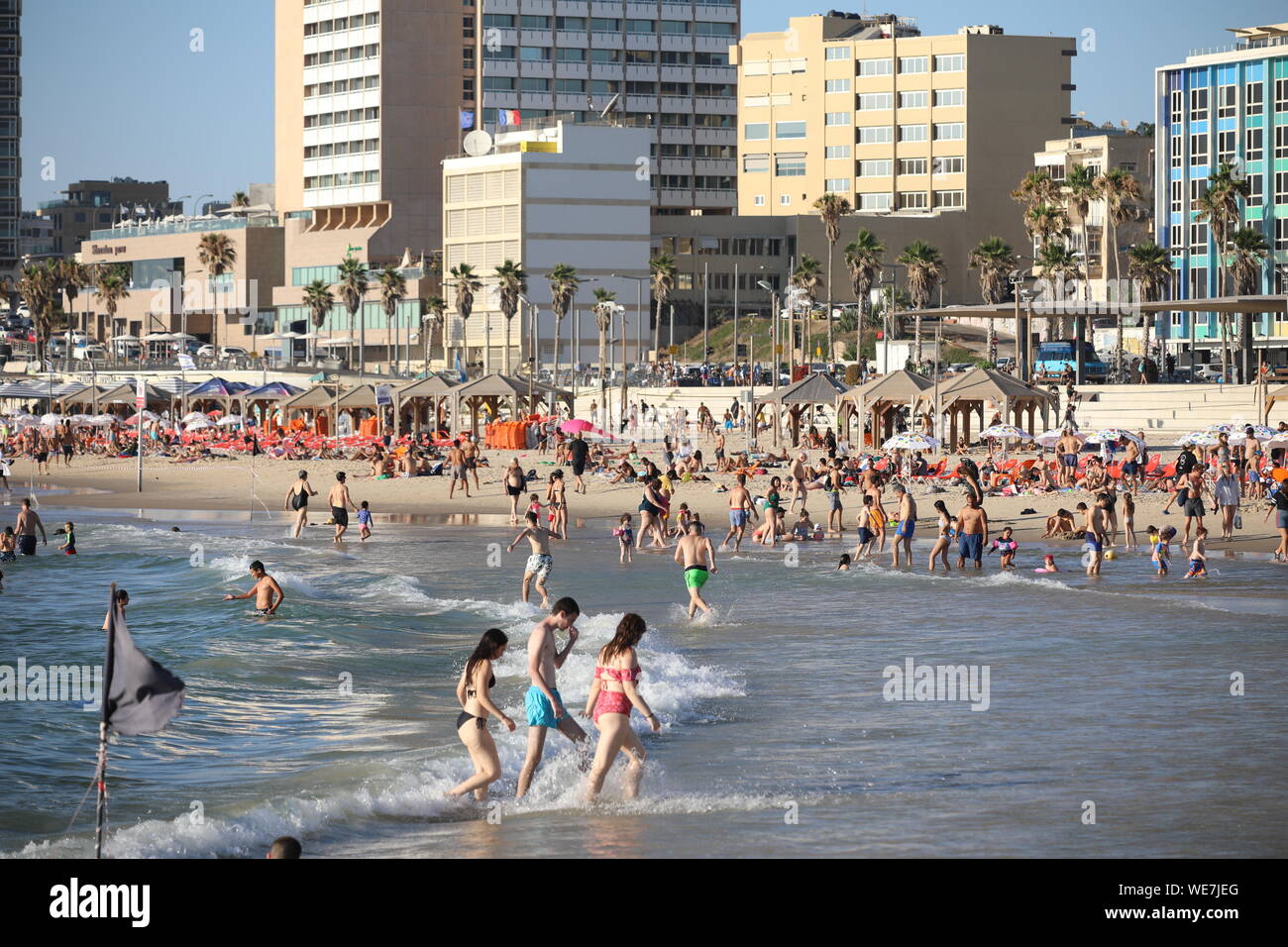 Israeli Beaches People Having Fun In Summer, Sun And Sea Stock Photo ...