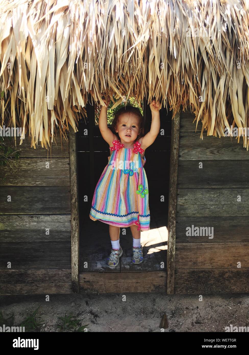 Girl in hut hi-res stock photography and images - Alamy