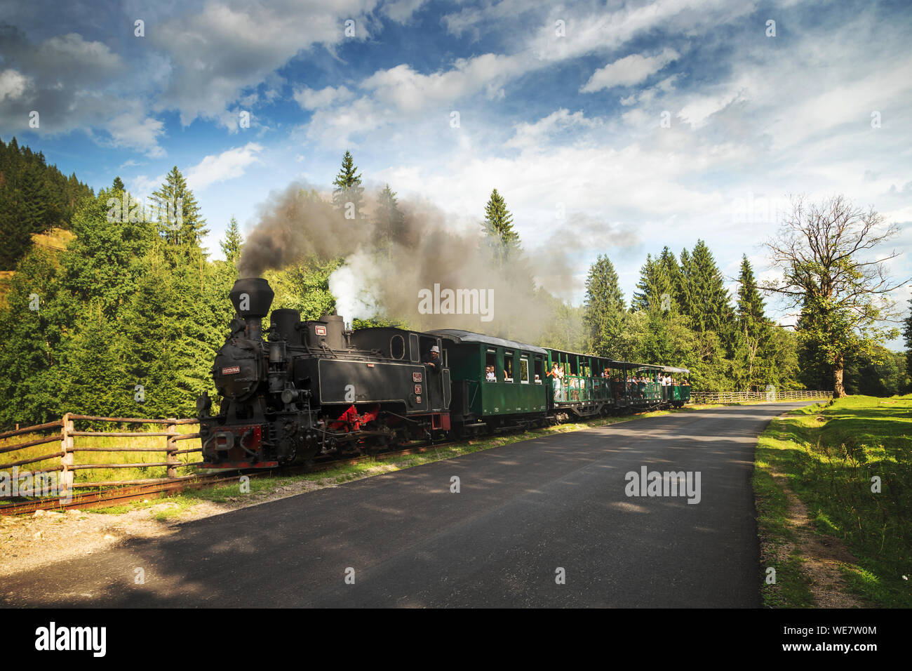 Aerial summer view of steam train in Bucovina. Mocanita Hutulca ...