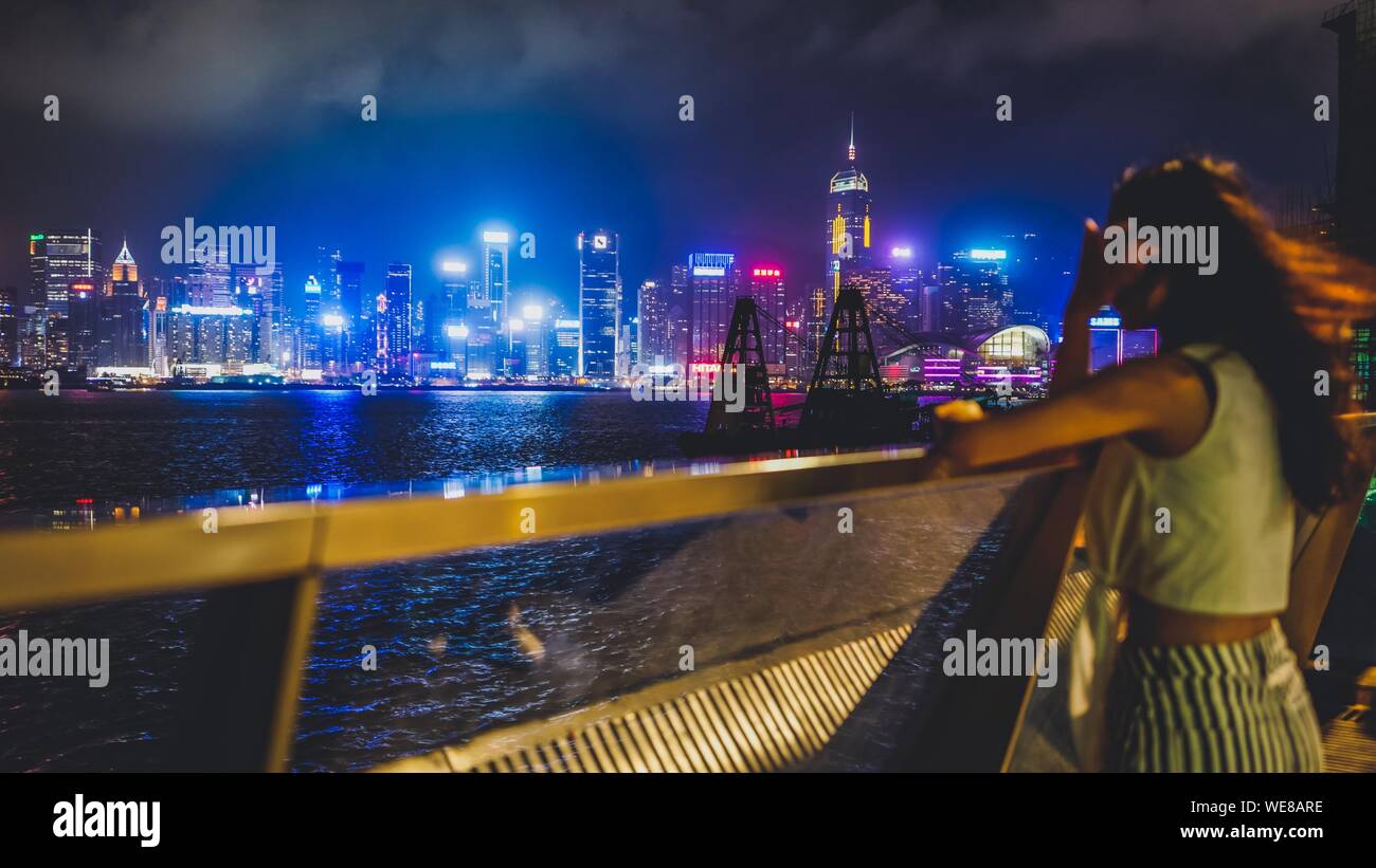 Woman Overlooking City River High Resolution Stock Photography and ...