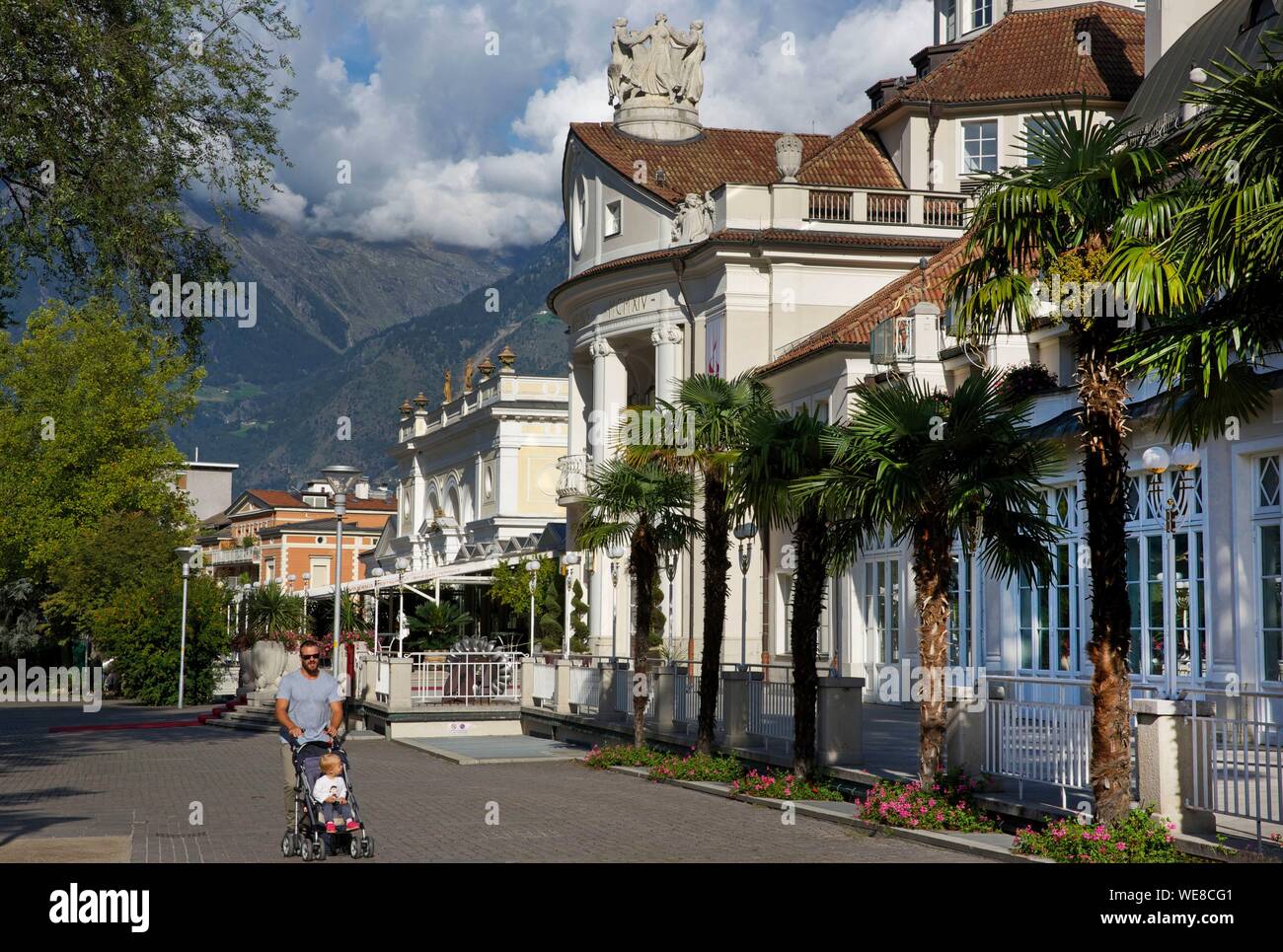 Italy, autonomous province of Bolzano, Merano, Man with a stroller in ...