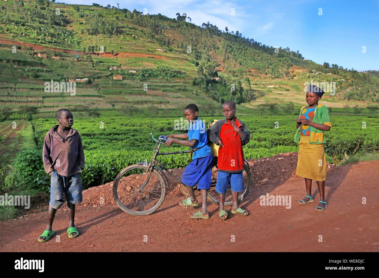 Rwanda, center of the country, children in colorful clothes on a ...