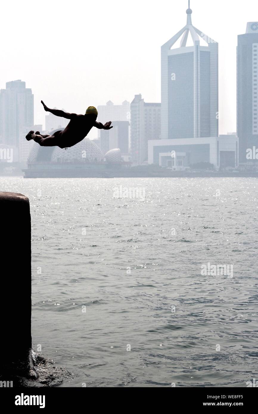 Man jumping over river hi-res stock photography and images - Alamy