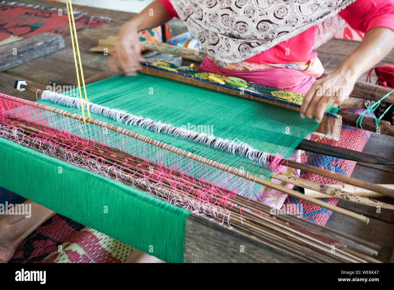 Woman working on loom hi-res stock photography and images - Alamy