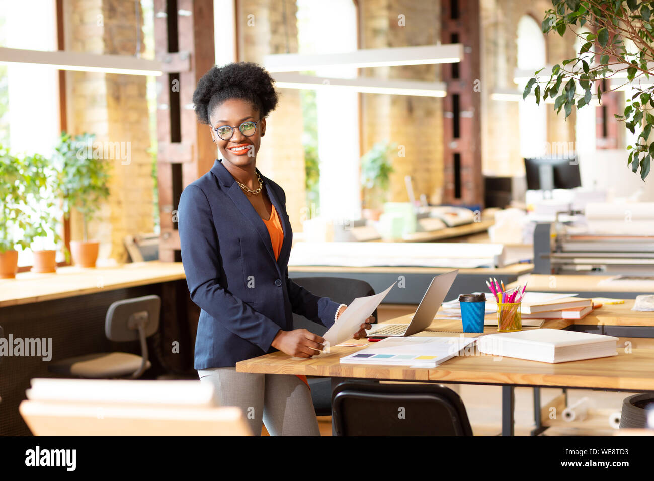Interior designer feeling excited before meeting client Stock Photo - Alamy