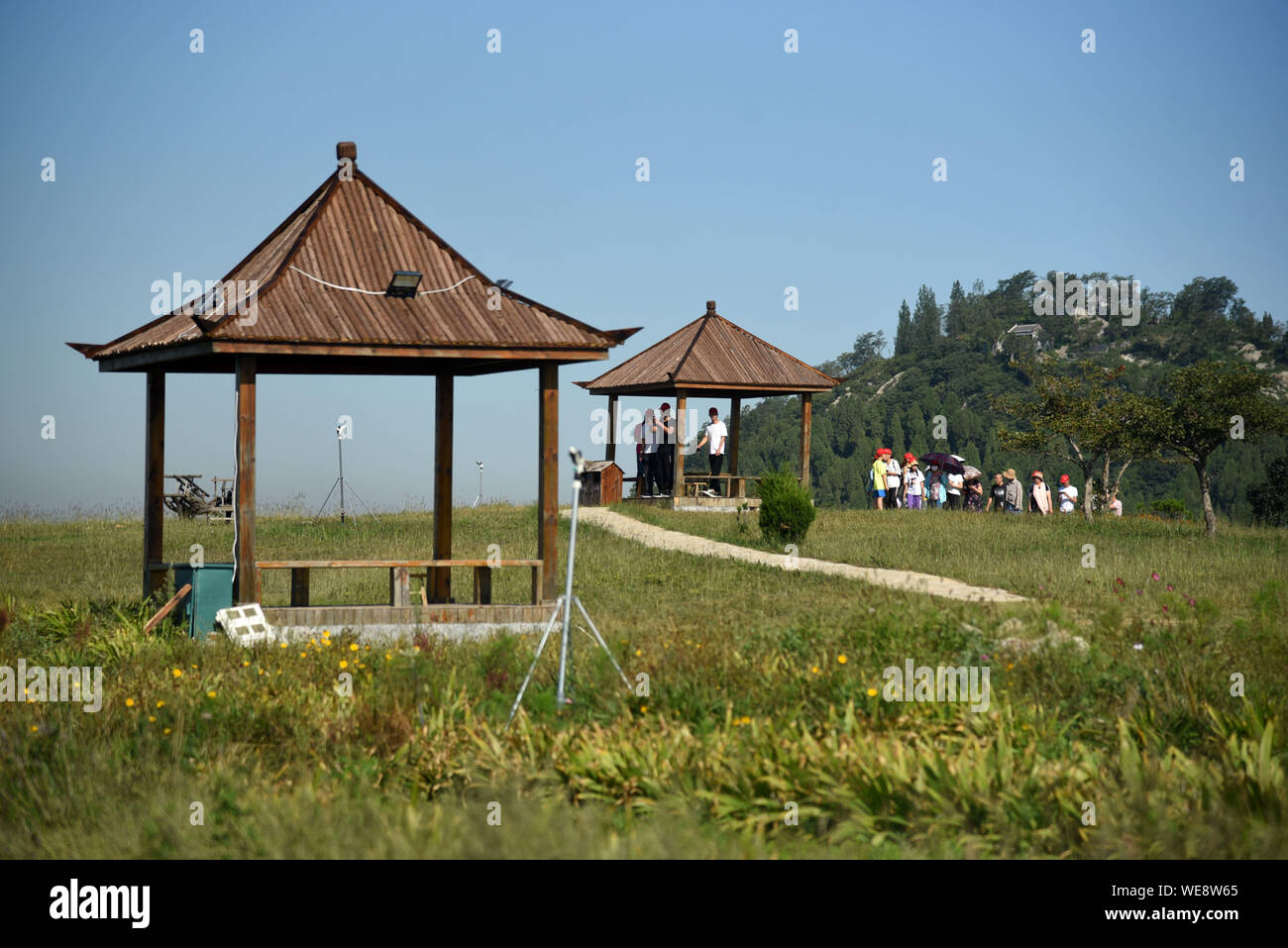 Mengyin. 30th Aug, 2019. Tourists visit the Daigu landform scenic spot ...