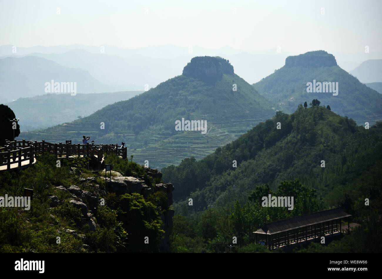 Mengyin. 30th Aug, 2019. Tourists visit the Daigu landform scenic spot ...