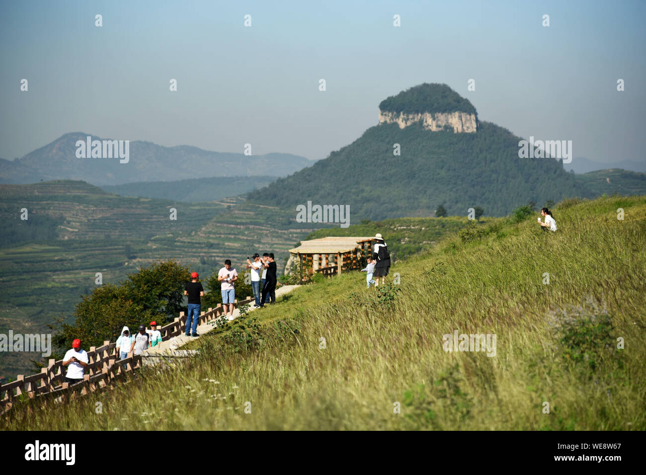 Mengyin. 30th Aug, 2019. Tourists visit the Daigu landform scenic spot ...