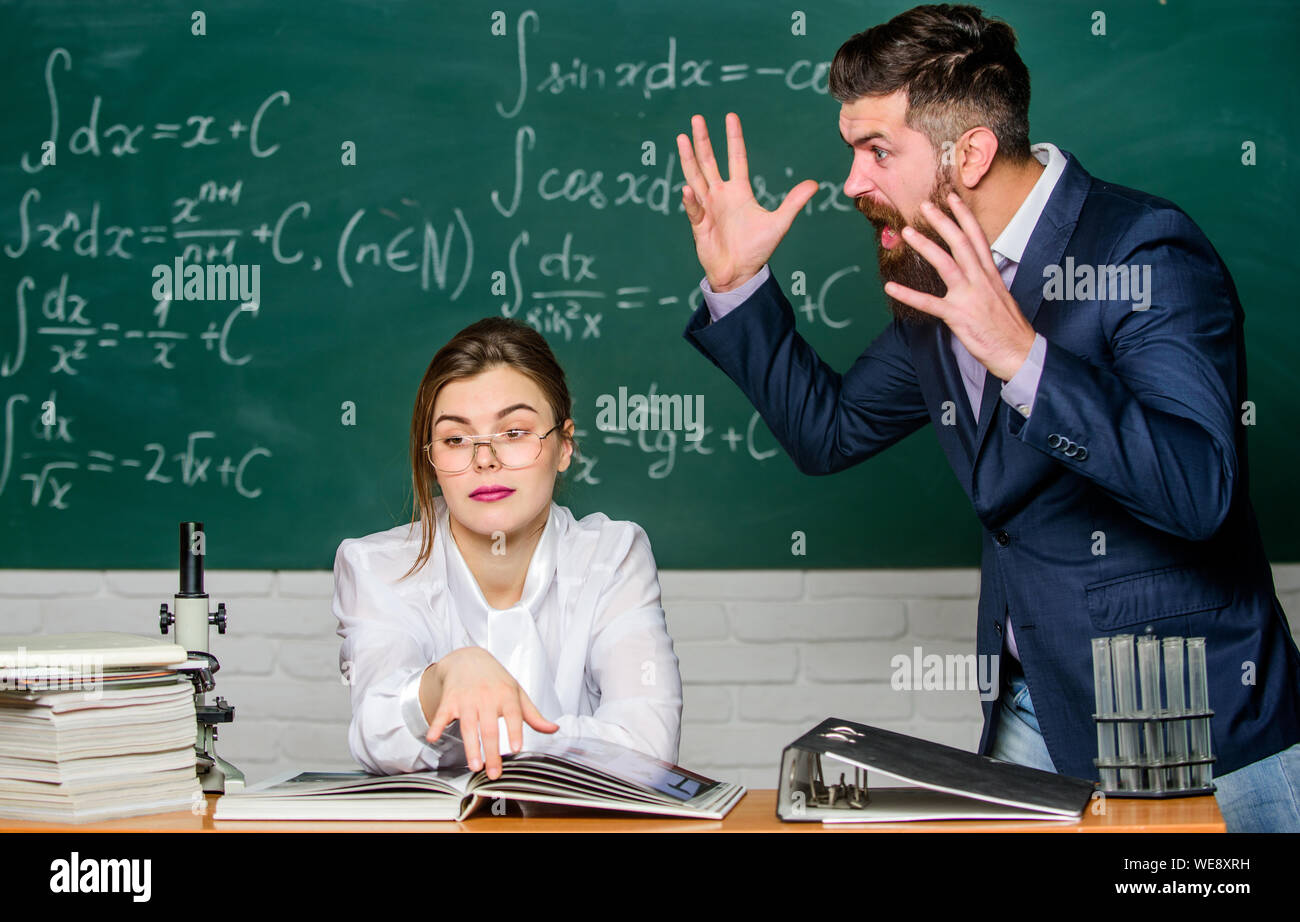 Man unhappy communicating. School principal talking about punishment ...