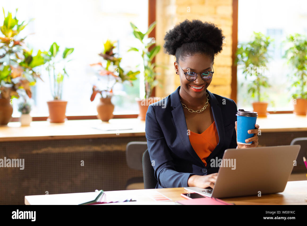 Happy interior designer feeling satisfied after finishing project Stock ...