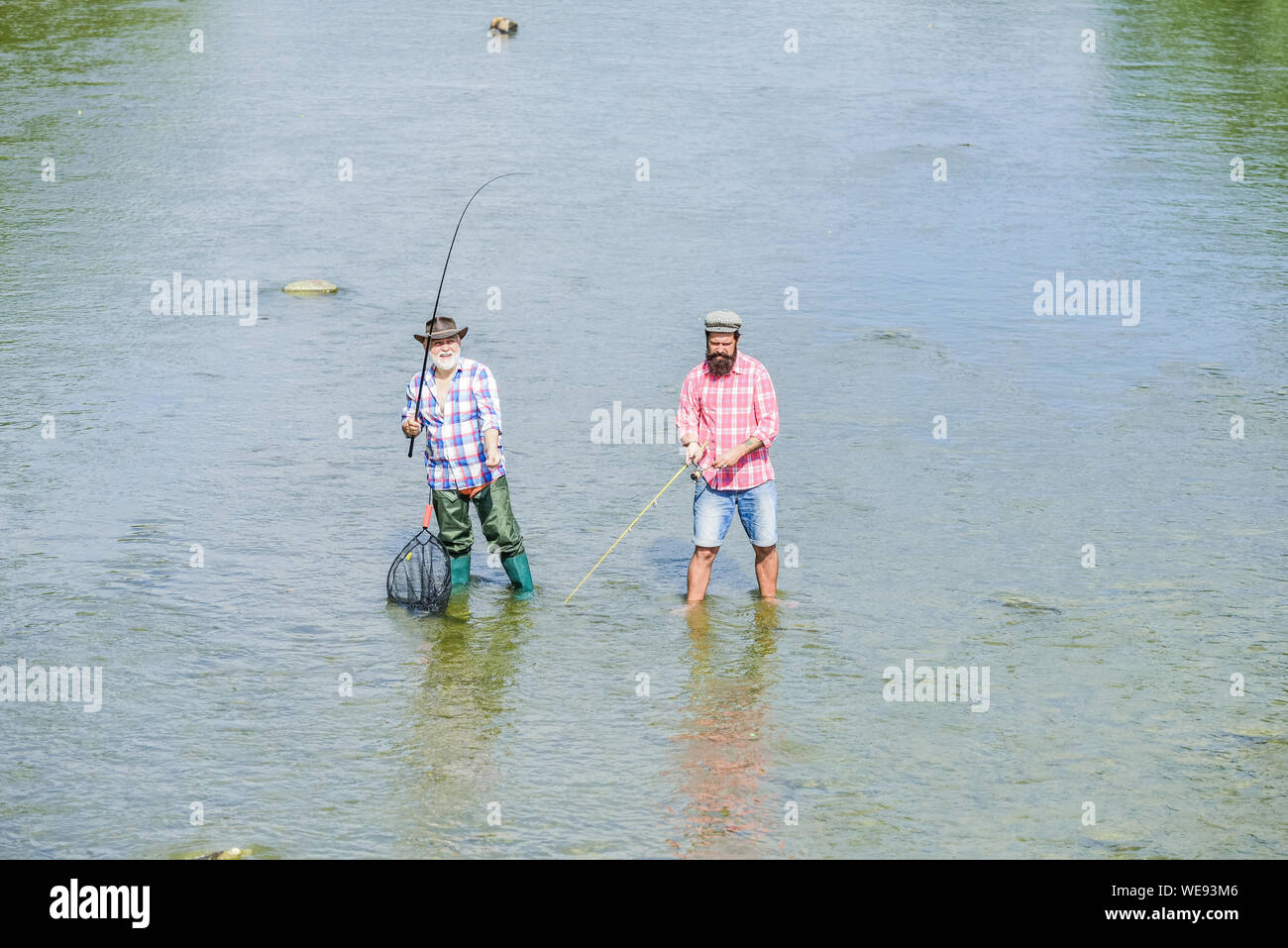 Teach man to fish and you feed him for lifetime. Summer weekend. Happy ...