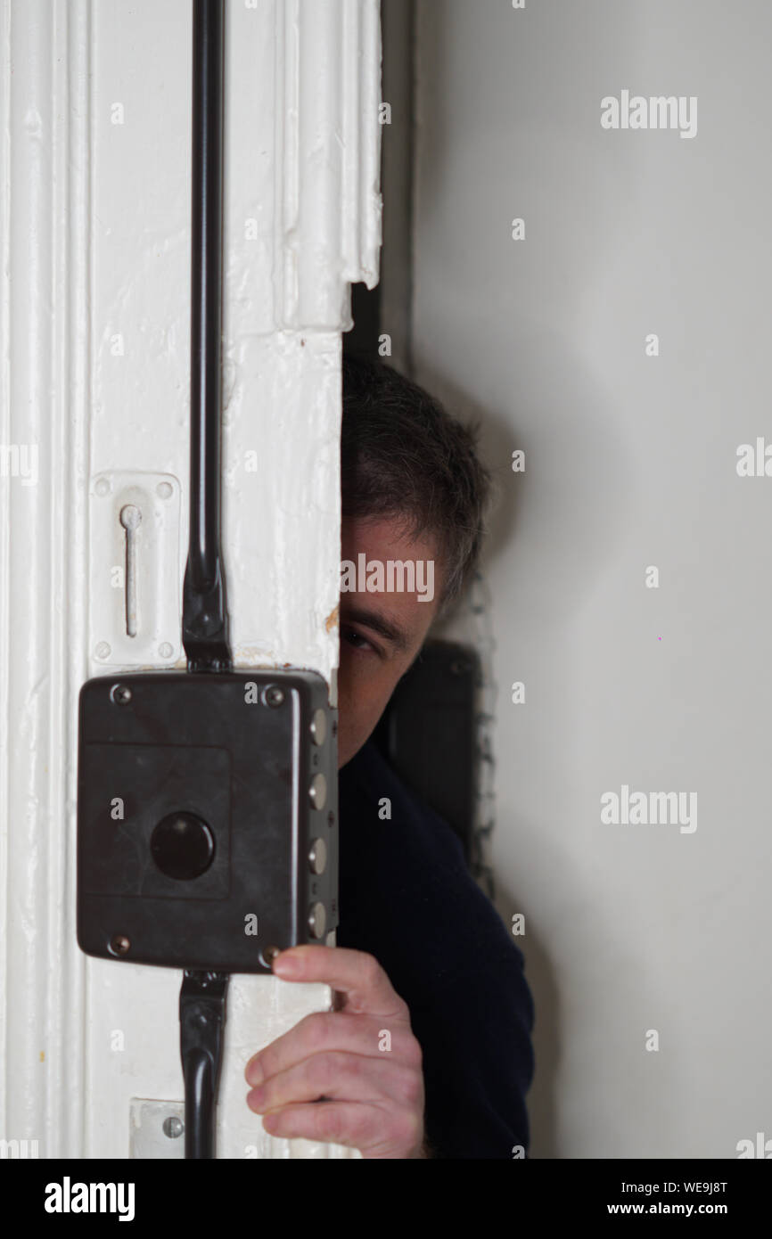 Hiding stalking hi-res stock photography and images - Alamy