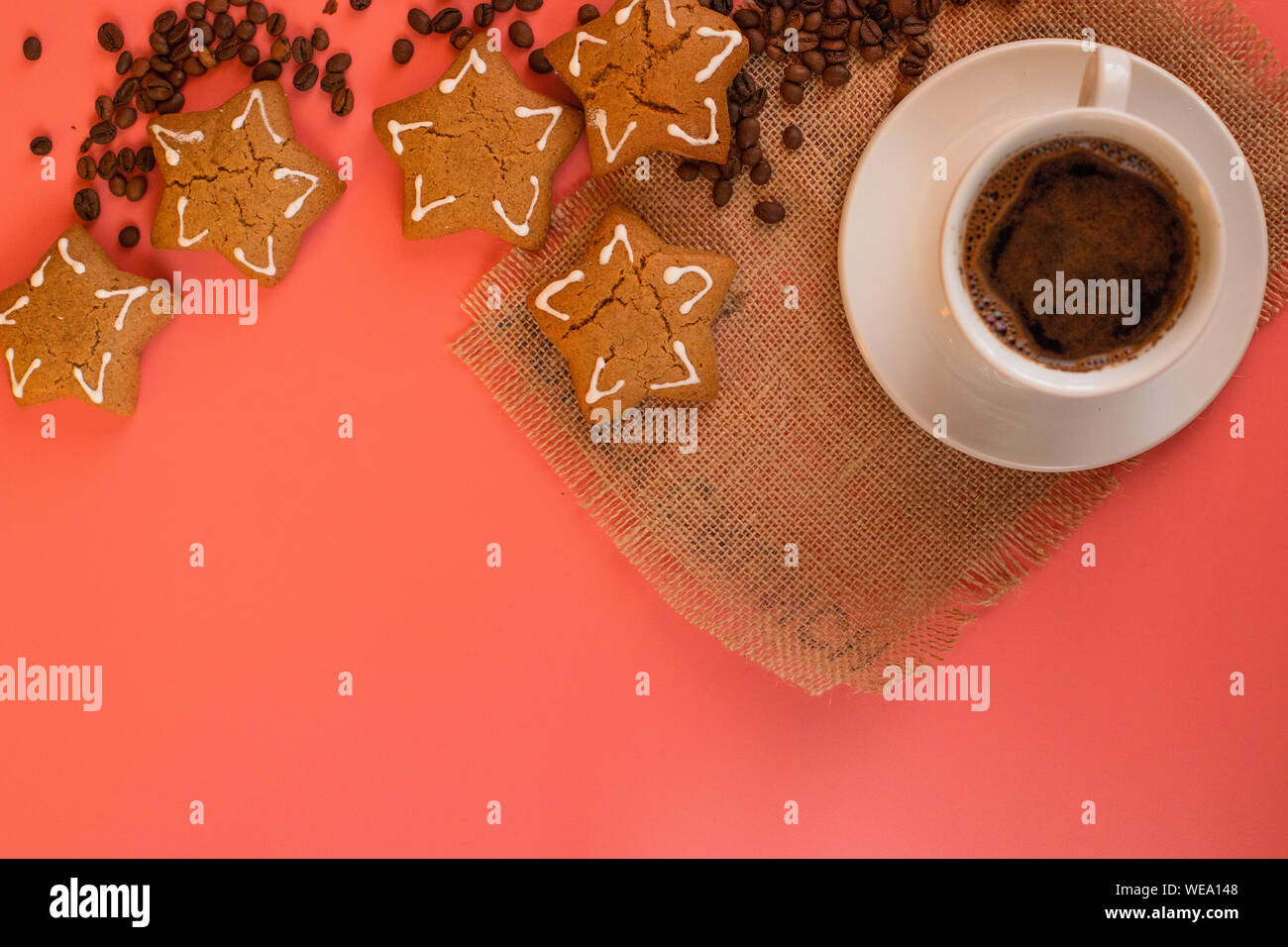 Coffee Cup gingerbread and coffee beans on pink background Stock Photo ...