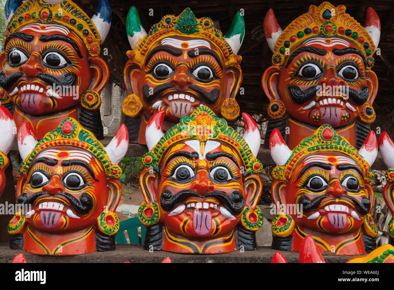 India, Pondicherry, Display of masks of an evil god at an arts and ...