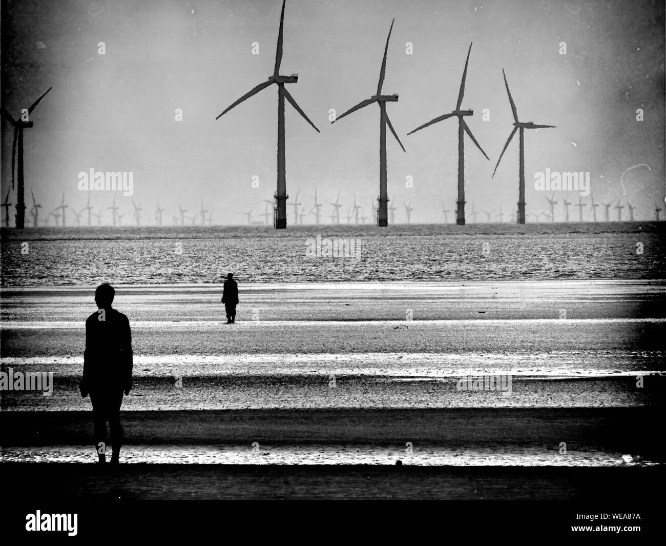 People wind energy silhouette hi-res stock photography and images - Alamy