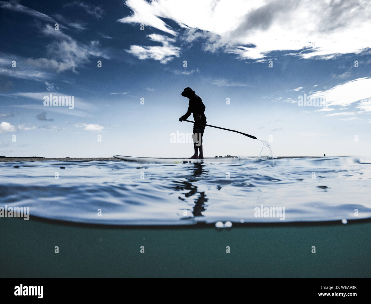 Woman Jumping In Water Stock Photo - Alamy