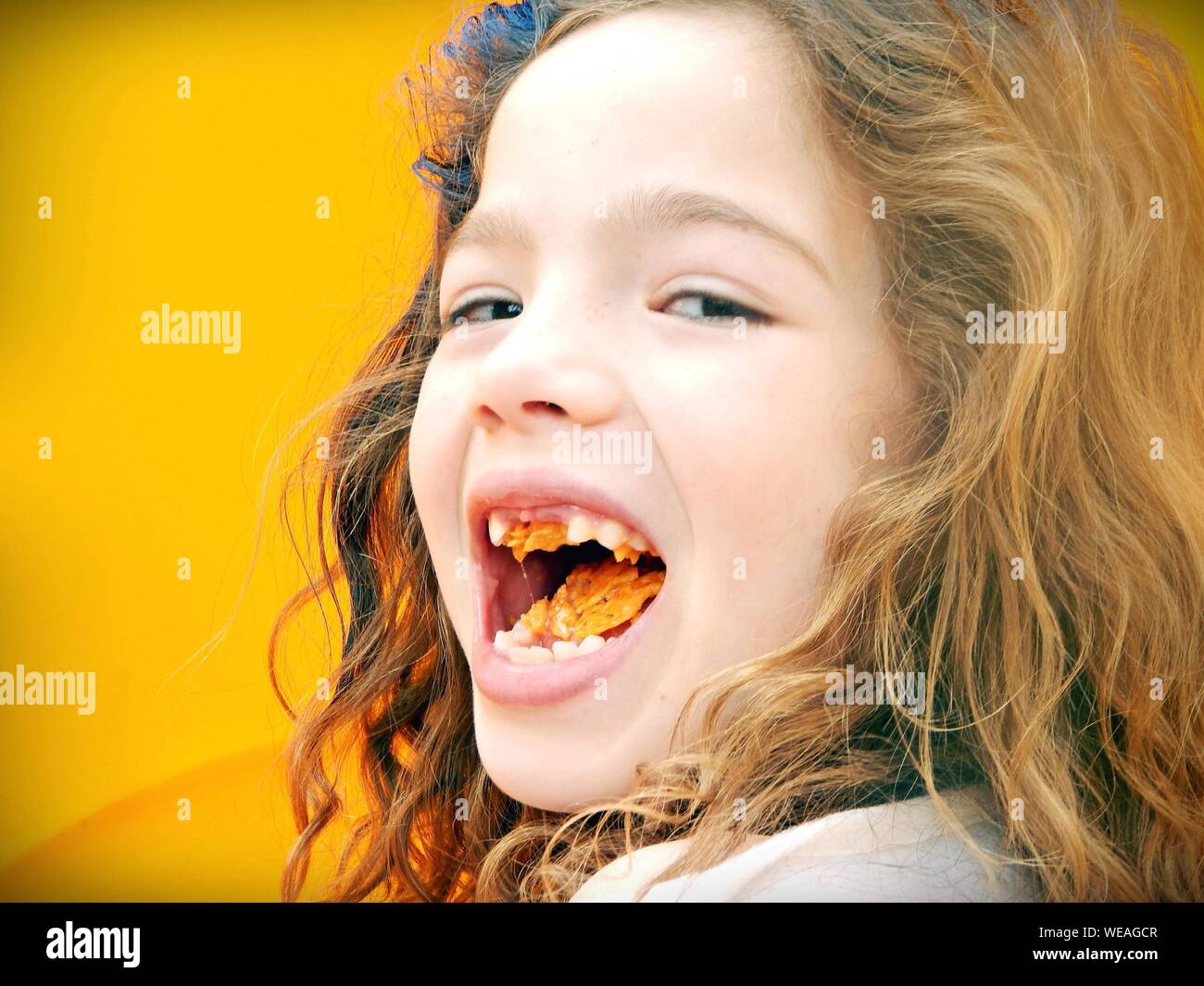 Smiling mouth with food close up hi-res stock photography and images ...