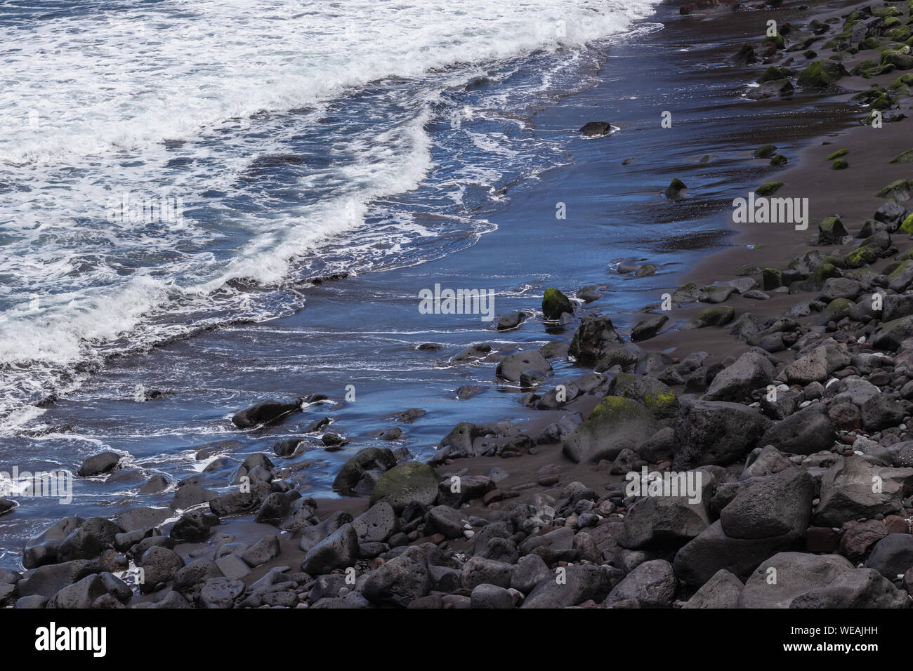 Black rocky islands hi-res stock photography and images - Alamy
