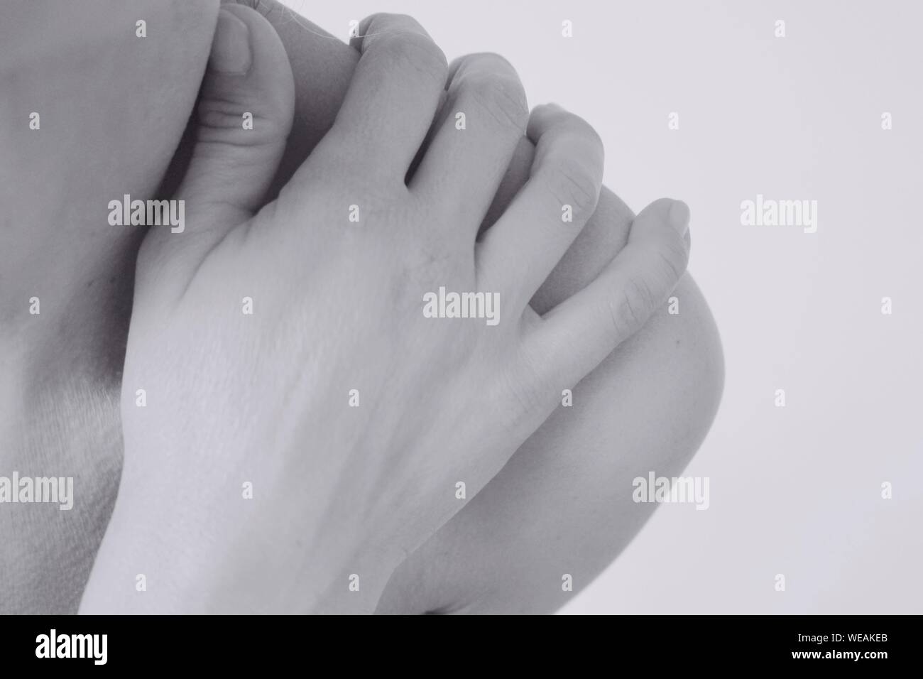 Hand over shoulder hi-res stock photography and images - Alamy