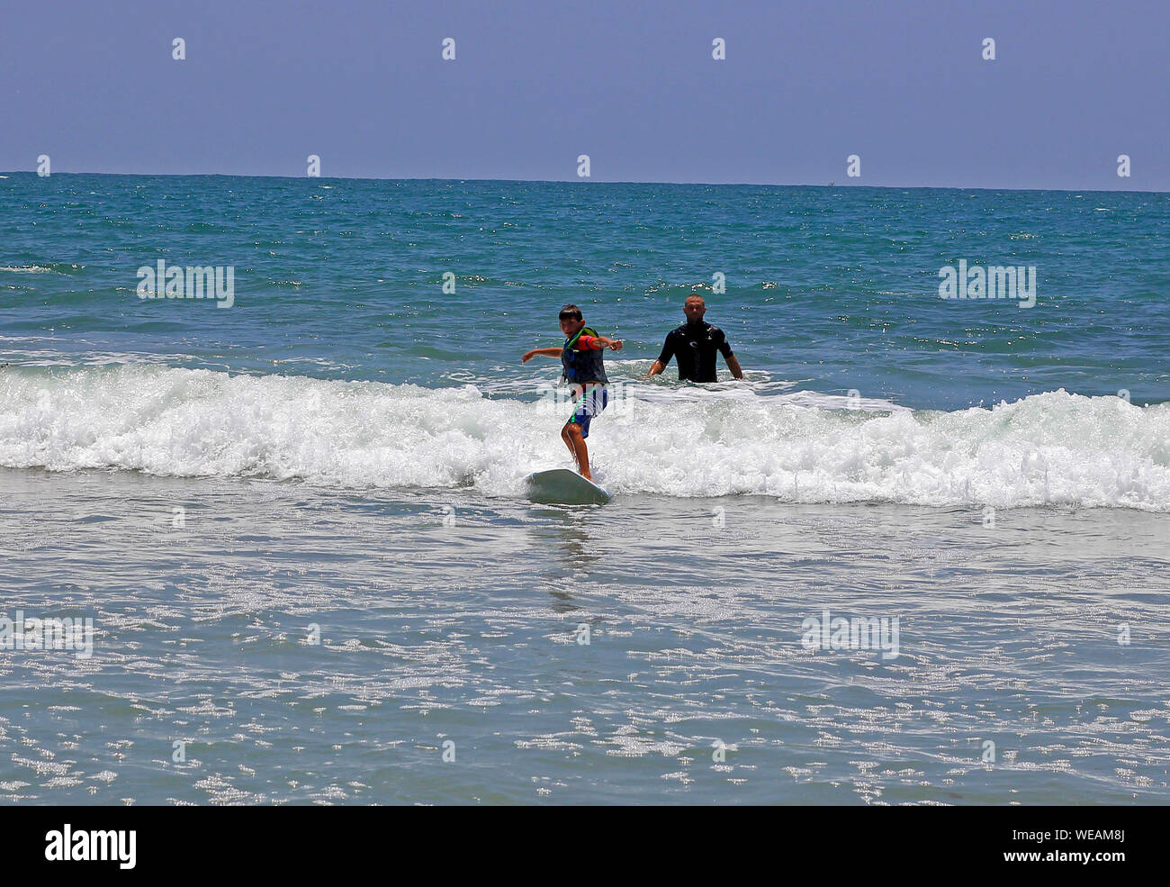 Father son surfboard hi-res stock photography and images - Alamy