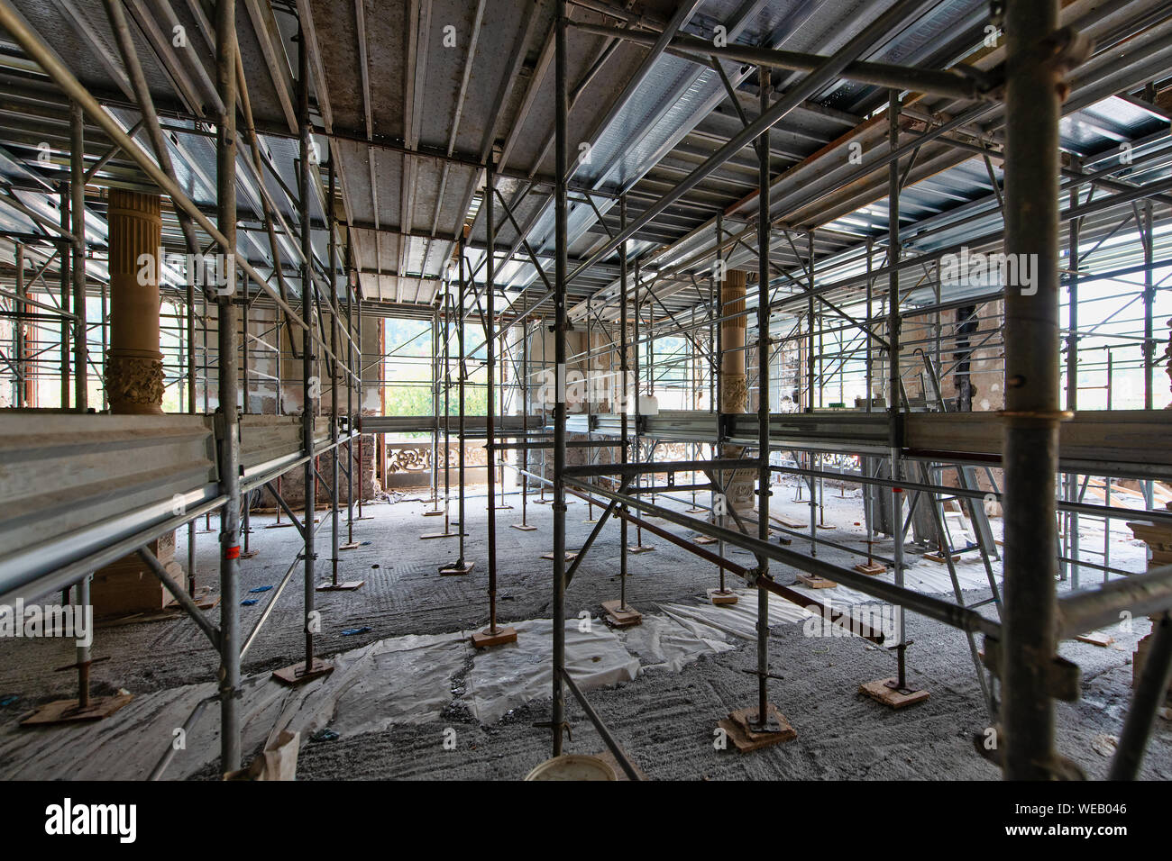 Internal construction site with scaffolding Stock Photo - Alamy