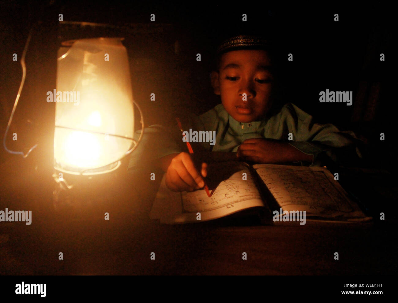Boy with lantern hi-res stock photography and images - Alamy