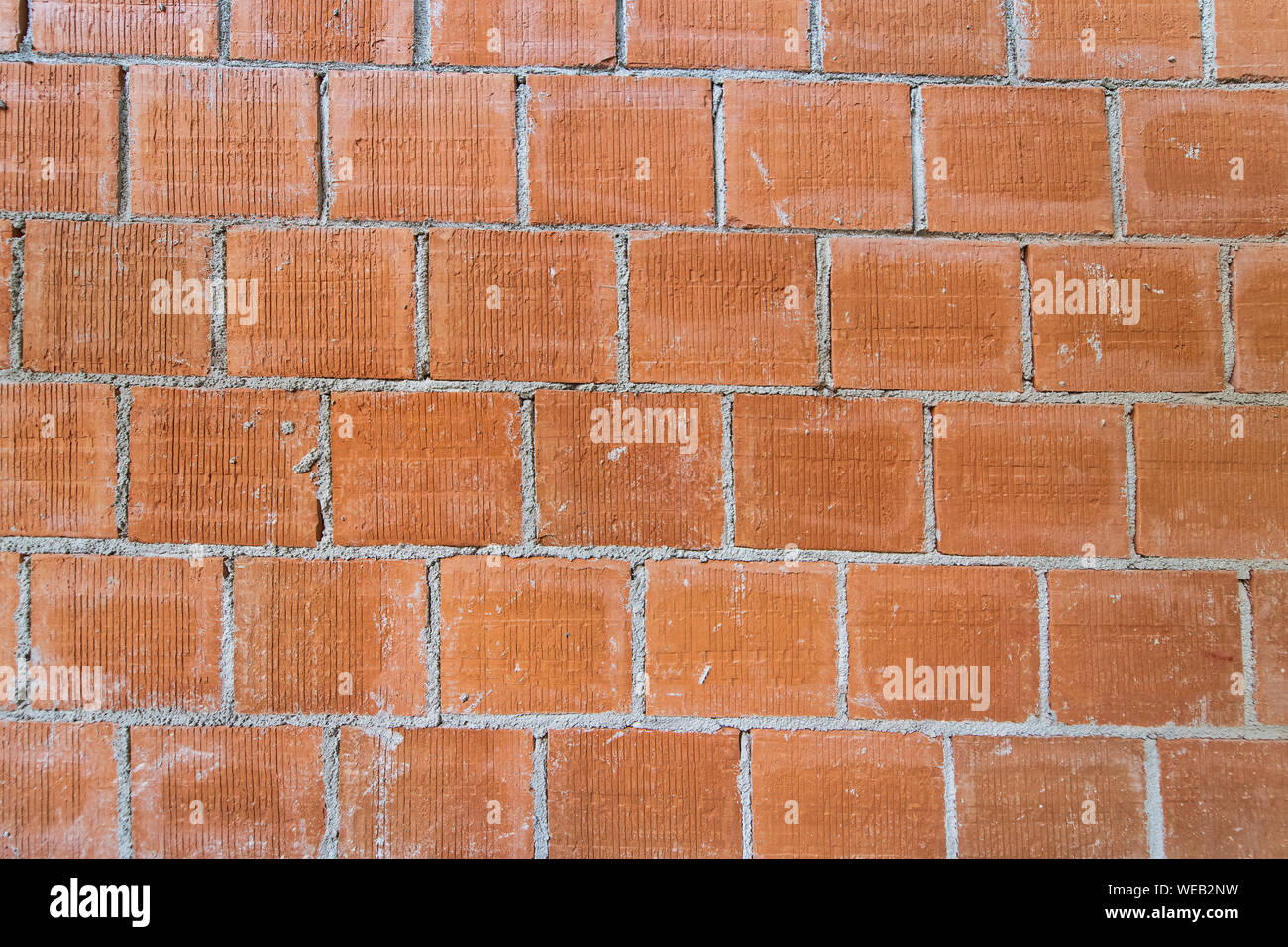 Plank of bricks being built on a building site Stock Photo - Alamy