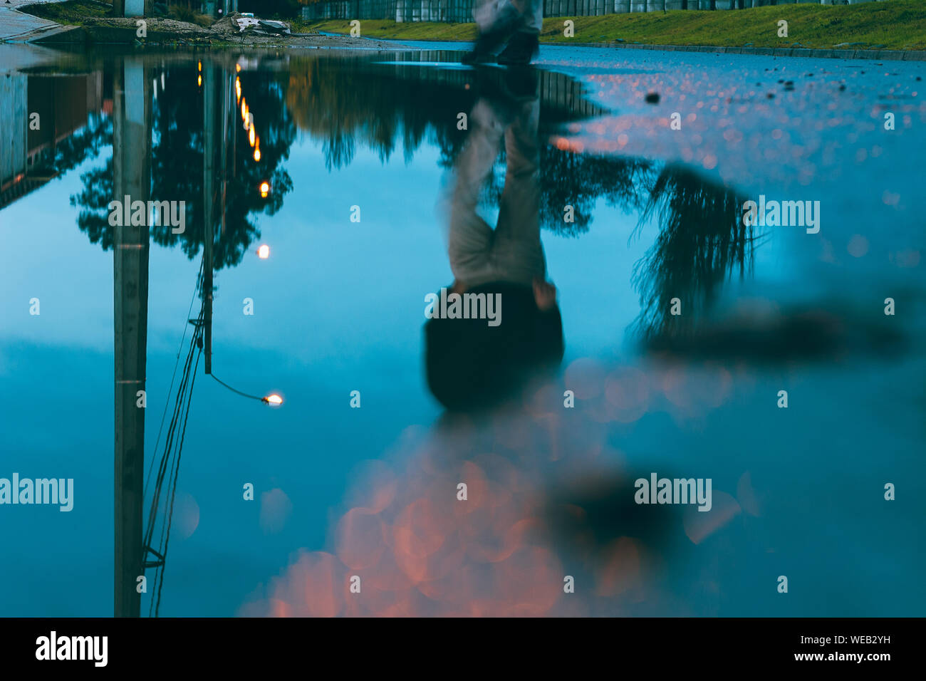 Man Standing In Puddle And Street High Resolution Stock Photography and ...