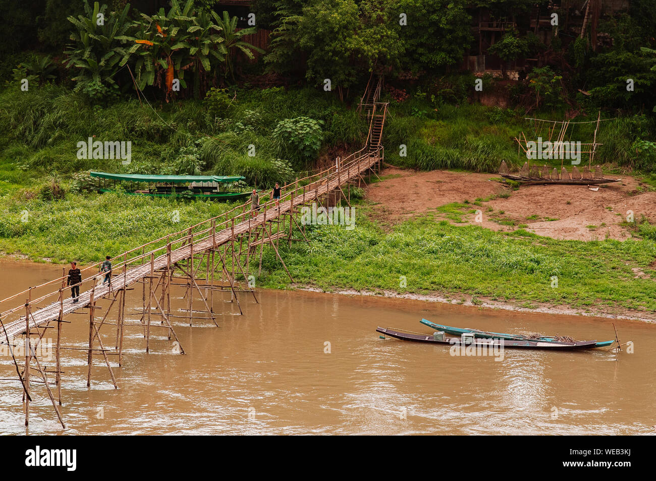 Laos wooden bridge village hi-res stock photography and images - Alamy