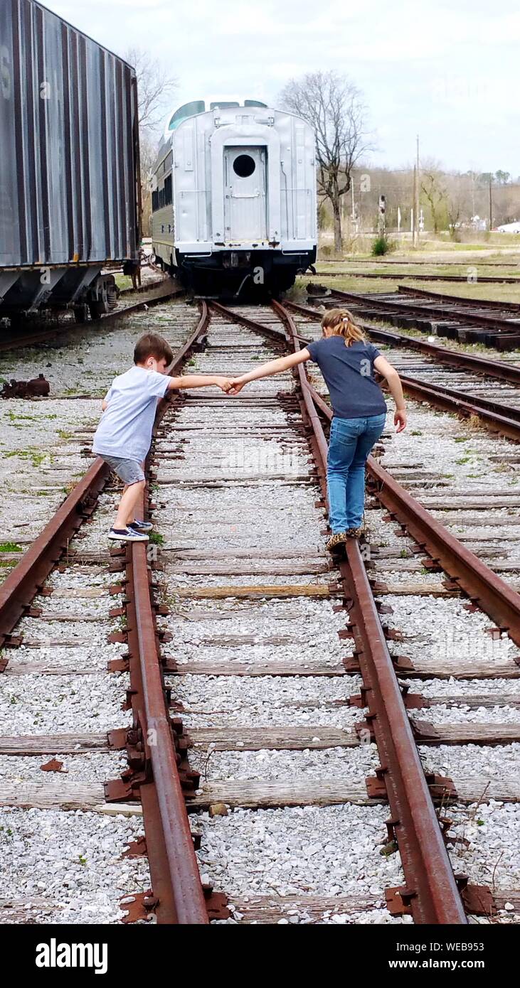 Hands holding rail hi-res stock photography and images - Alamy