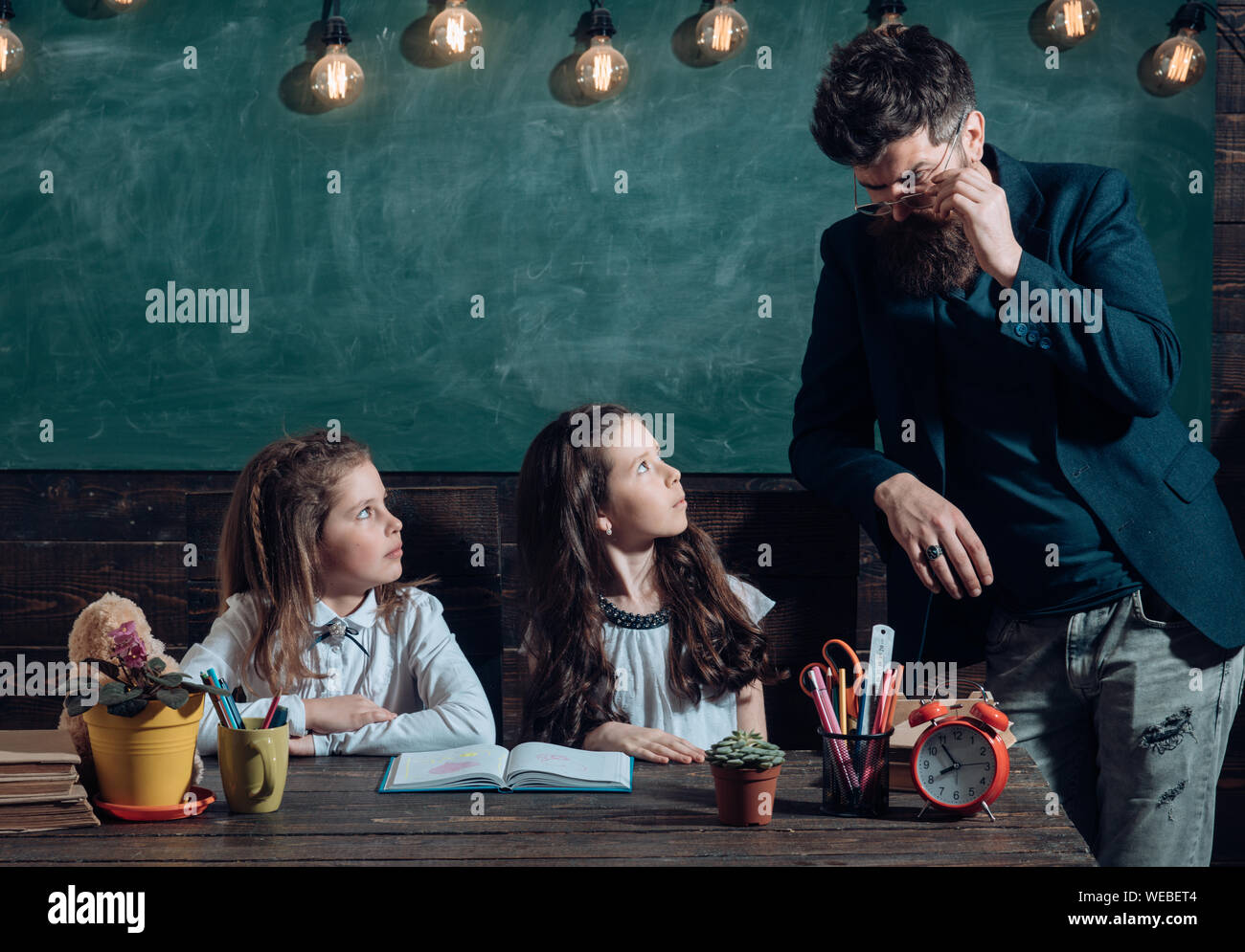 Boy helping girl math hi-res stock photography and images - Alamy