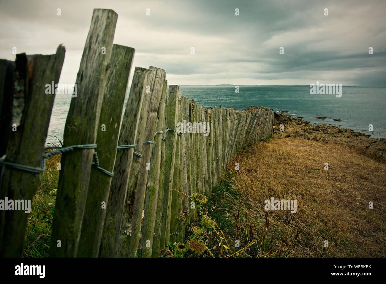 Fence beach barbed wire hi-res stock photography and images - Alamy