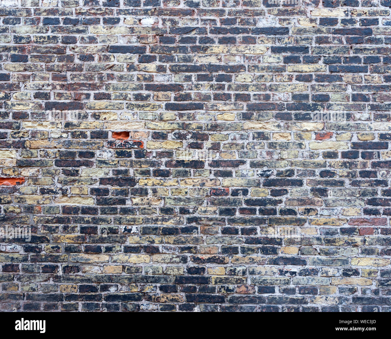 part of very old medieval brick wall in old dutch town Stock Photo - Alamy