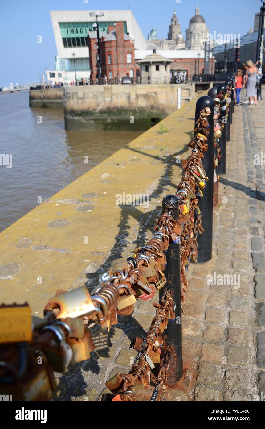 Love locks fastened to chain at Royal Albert Dock, Liverpool, England ...