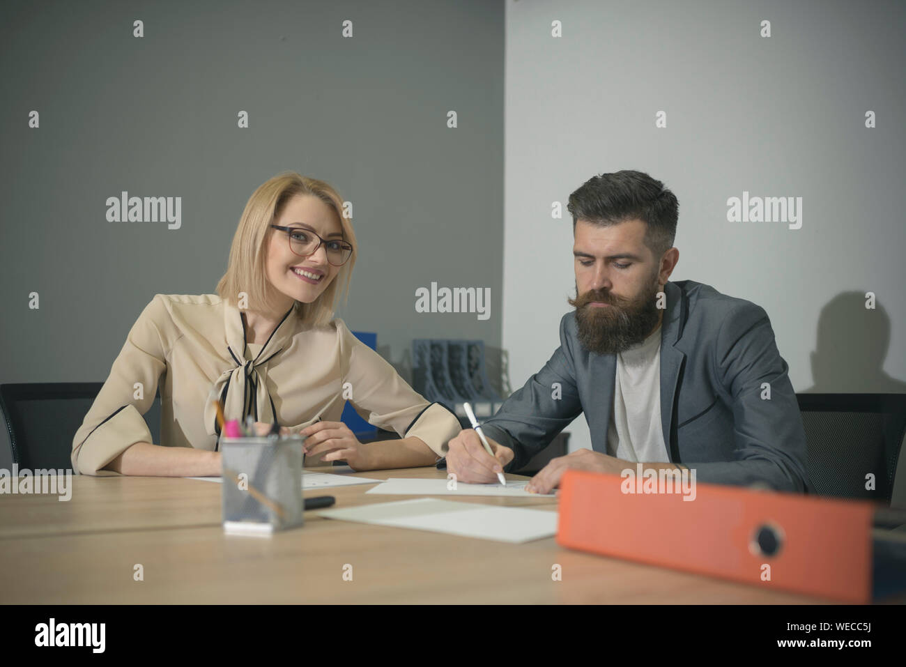 Man and woman working in office. Collaborative teamwork concept Stock ...