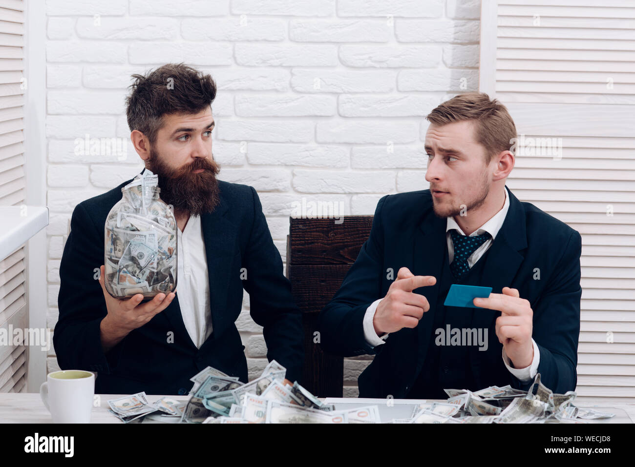 Business partners, businessmen at meeting in office. Manager with beard ...