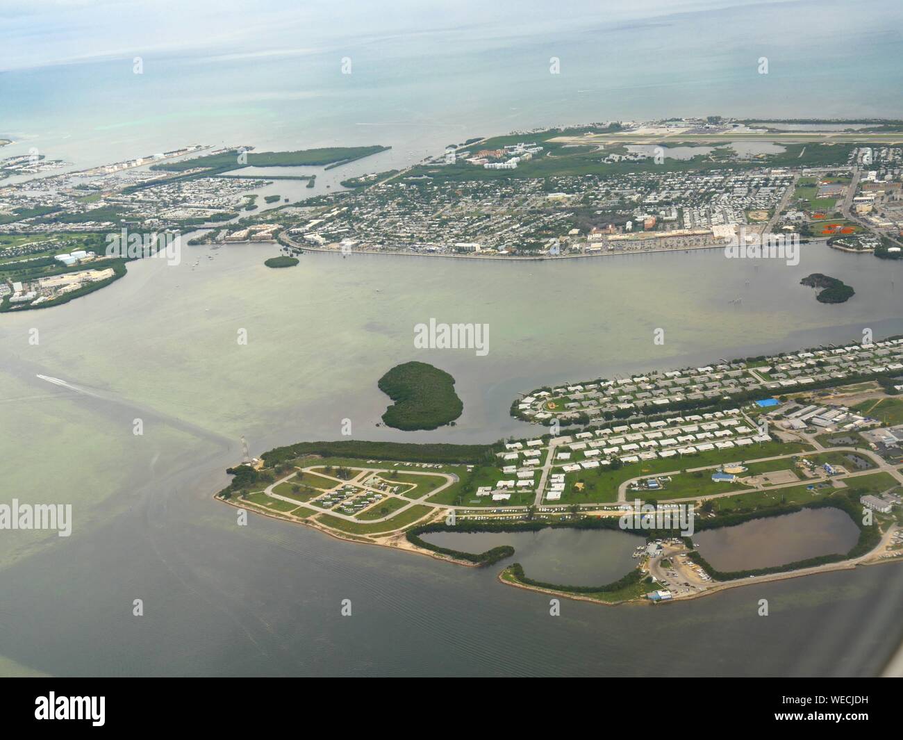 Scenic Key West, aerial view seen from an airplane window. The Key West ...