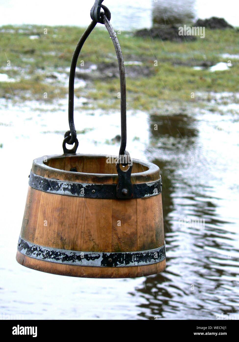 Hanging water bucket hi-res stock photography and images - Alamy