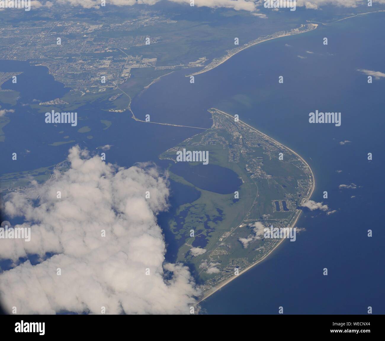 Medium close up, aerial view of Florida seen from an airplane window ...