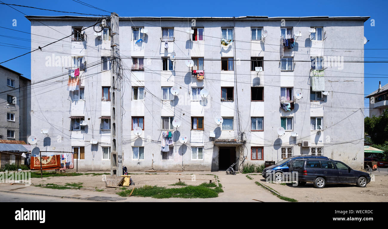 Five story high brutalist apartment building with parabolic dishes from ...