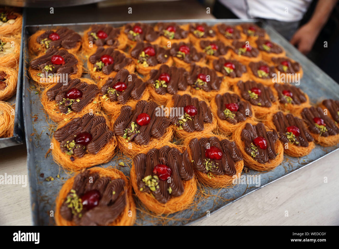 Konafa with nuts hi-res stock photography and images - Alamy